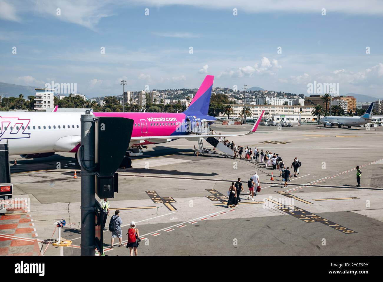 Nice, France - August 5, 2024: Wizz Air aircraft boarding passengers at ...