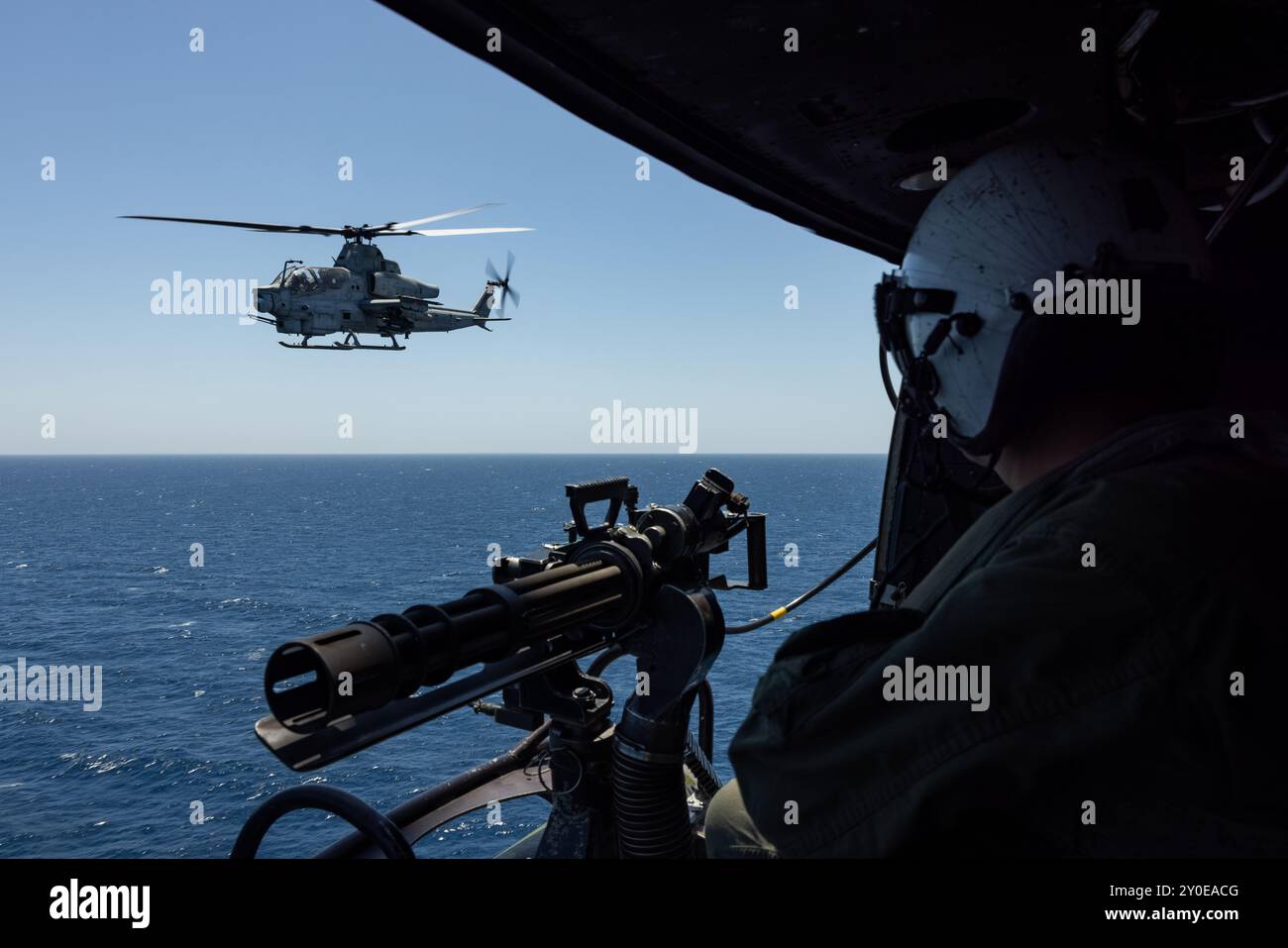 U.S. Marine Corps Cpl. Scott Detar, a UH-1Y Venom crew chief with ...