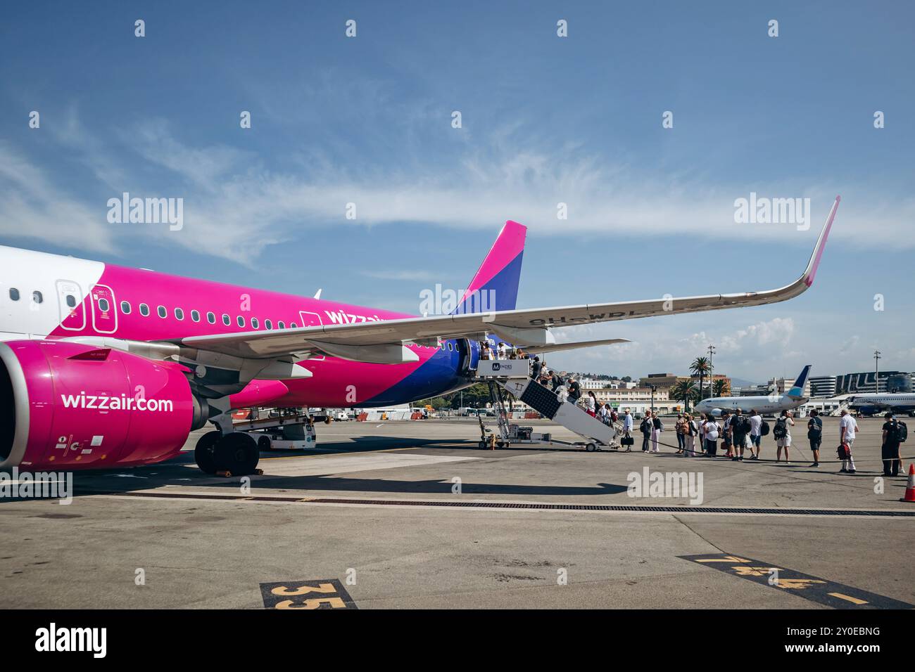 Nice, France - August 5, 2024: Wizz Air aircraft boarding passengers at ...