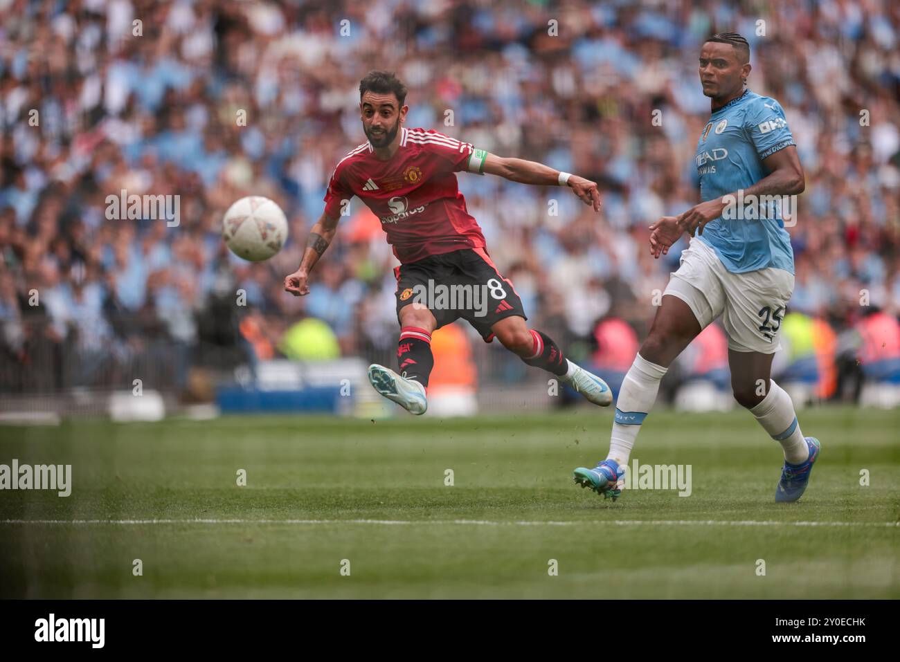 Bruno Fernandes of Manchester United shooting under pressure from ...