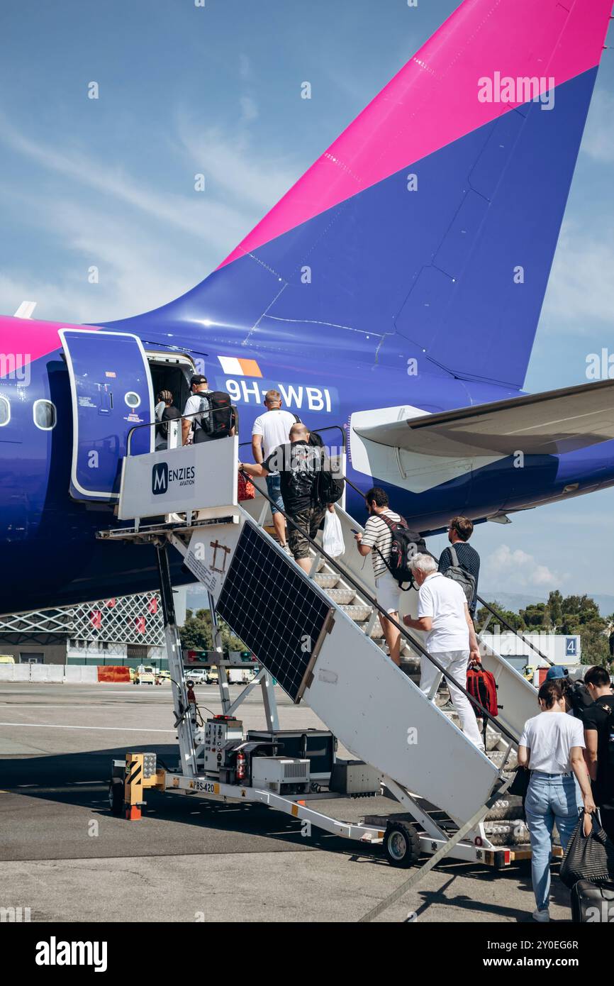 Nice, France - August 5, 2024: Wizz Air aircraft boarding passengers at ...