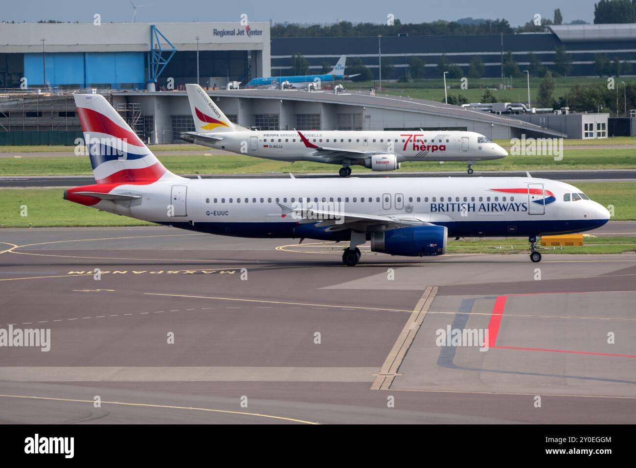 A Side View Of A British Airways Embraer E190SR Plane At Schiphol ...