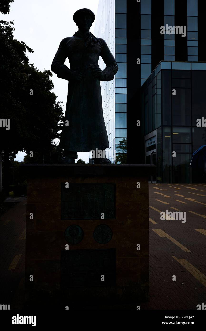 Memorial statue, in the town centre of Corby, England, to the men who ...