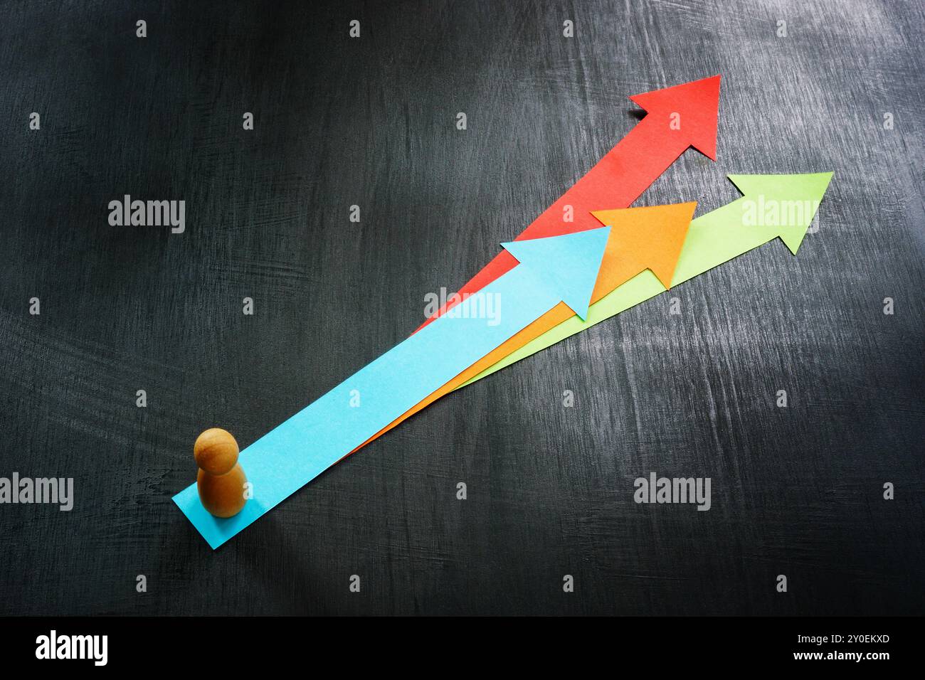 Figure standing on forward arrows. Leadership and goal achievement ...
