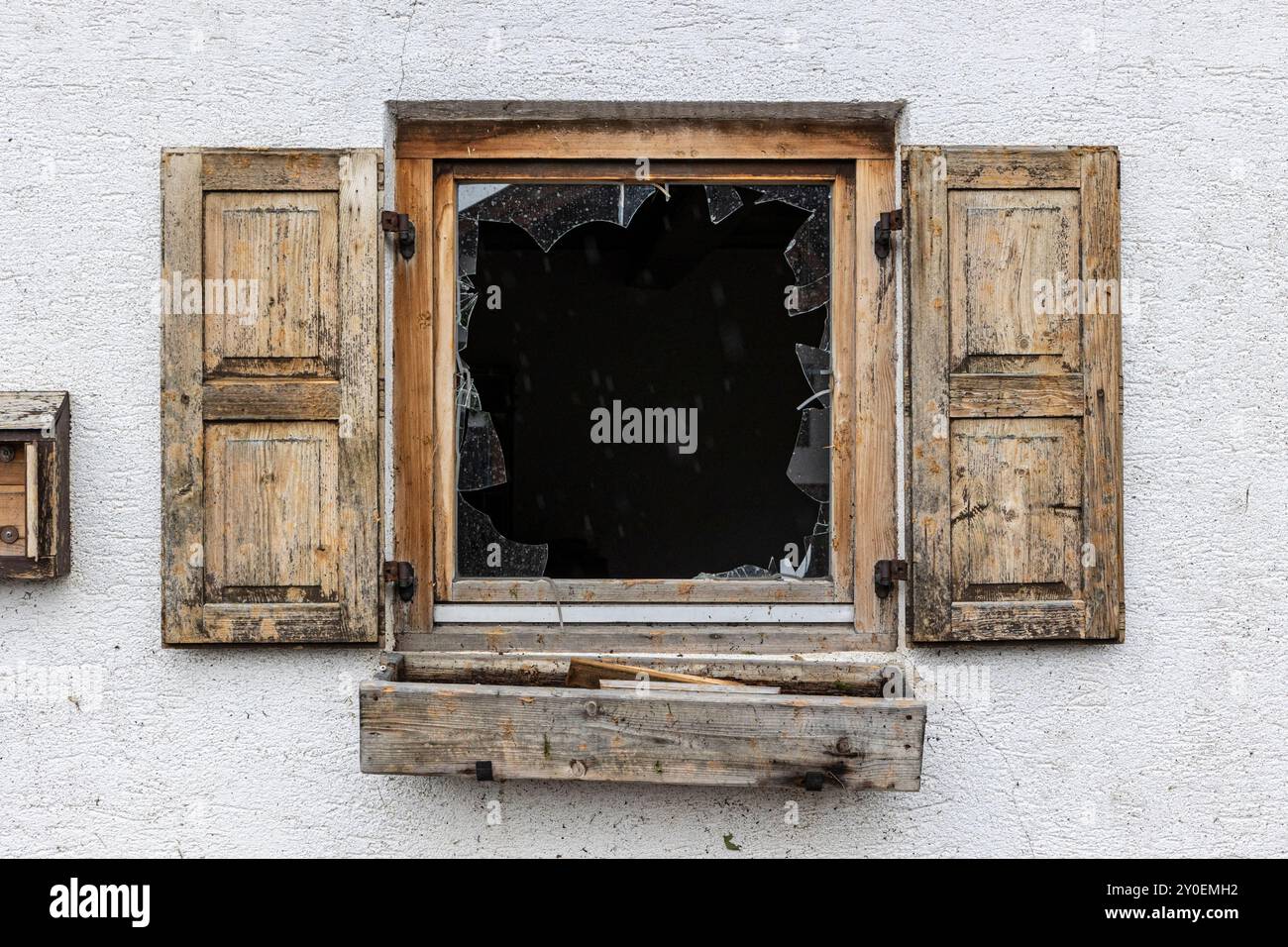 Destroyed window at a farmer´s house after a heavy thunderstorm with ...