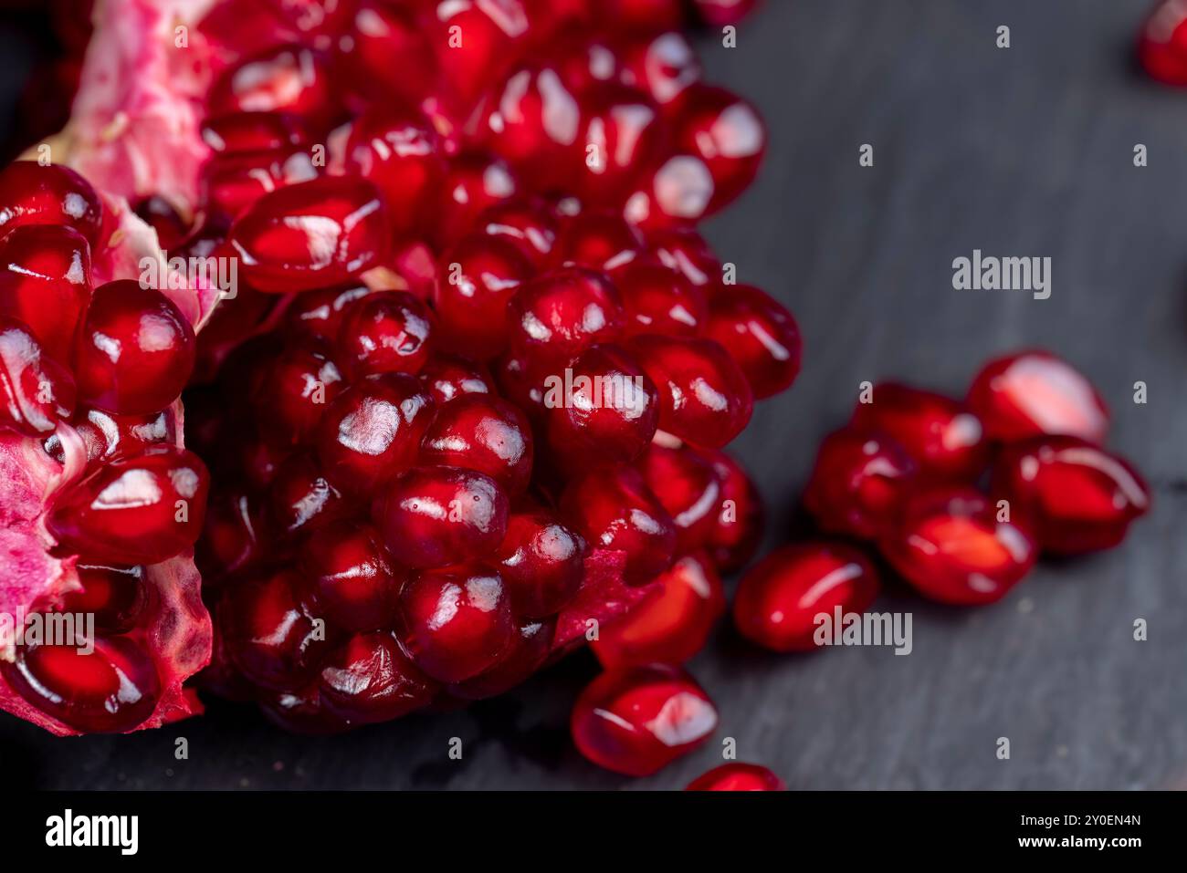 peeled red ripe pomegranate with red sweet grains, juicy pomegranate ...
