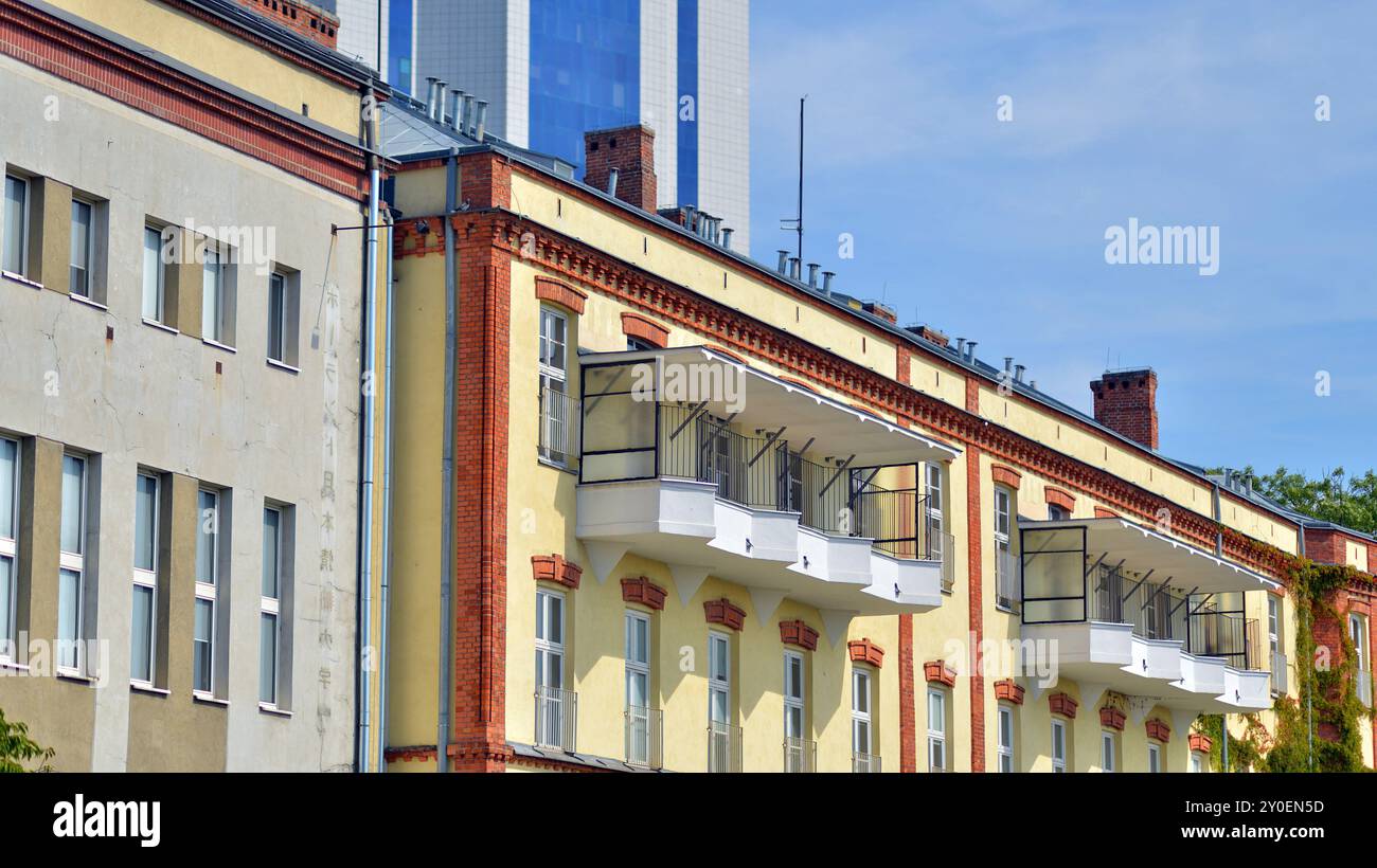 Contrast of old and new buildings in downtown . An ancient building ...