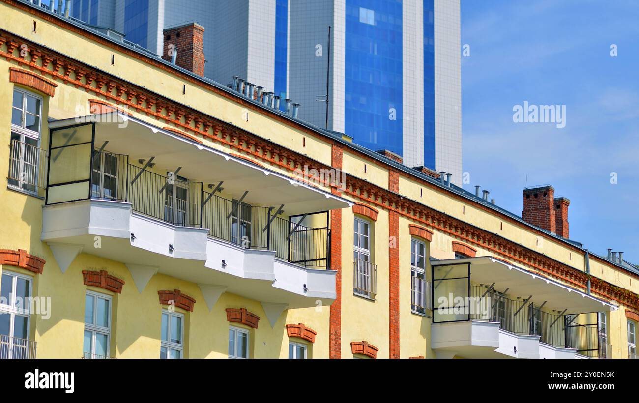 Contrast of old and new buildings in downtown . An ancient building ...