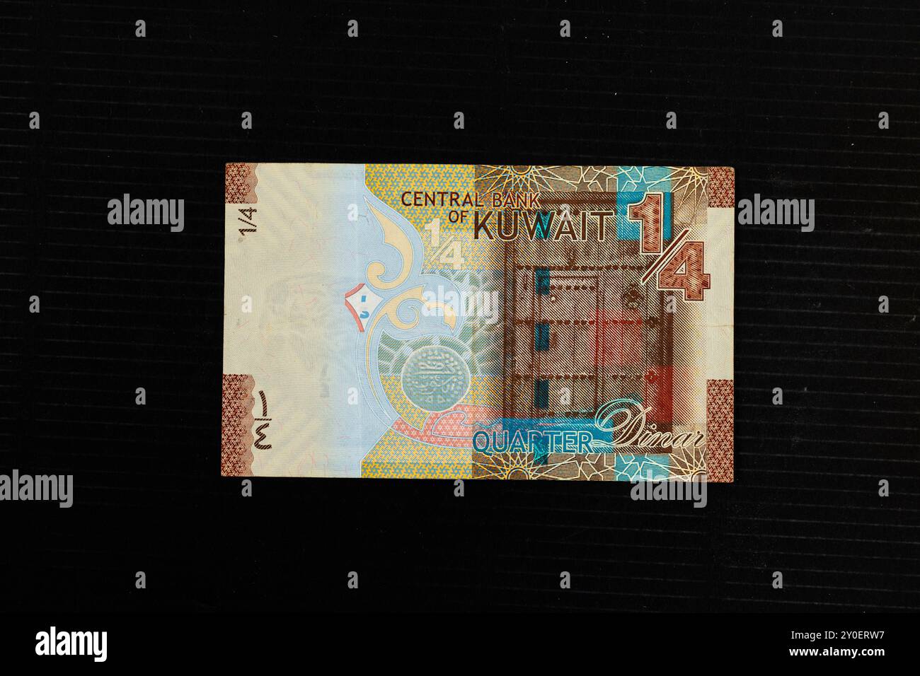 Kuwait quarter dinar banknote featuring a traditional wooden Kuwaiti ...