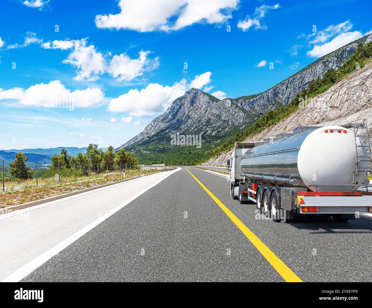Fuel truck on a picturesque road Stock Photo - Alamy
