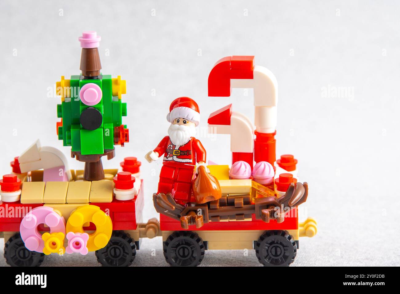 Christmas tree and Santa Claus train toy. Lego constructor from mini ...
