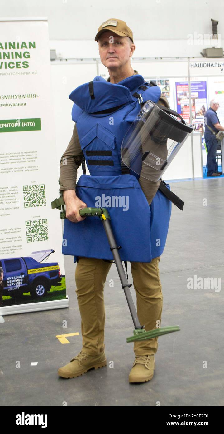 Kyiv, Ukraine, May 28, 2024: Man standing in mine clearance uniform ...
