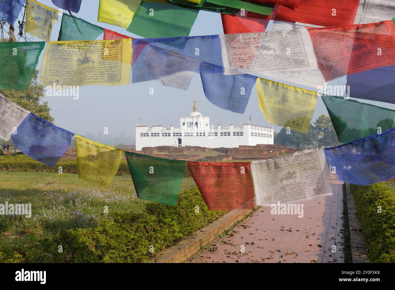 Maya Devi temple and prayer flags, Lumbini, Nepal Stock Photo - Alamy