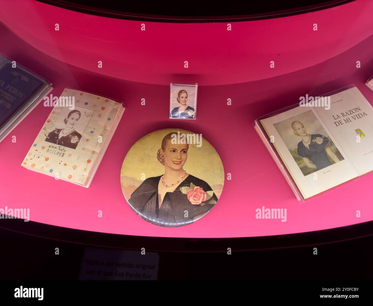 Display of items with the official state portrait of Eva Peron in 1951 ...