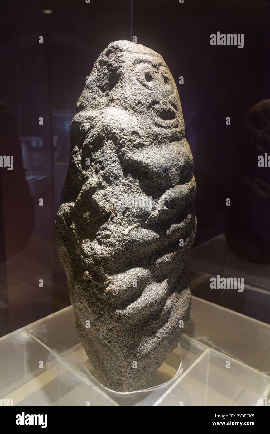 A carved stone anthropomorphic statue in the Pio Pablo Diaz ...