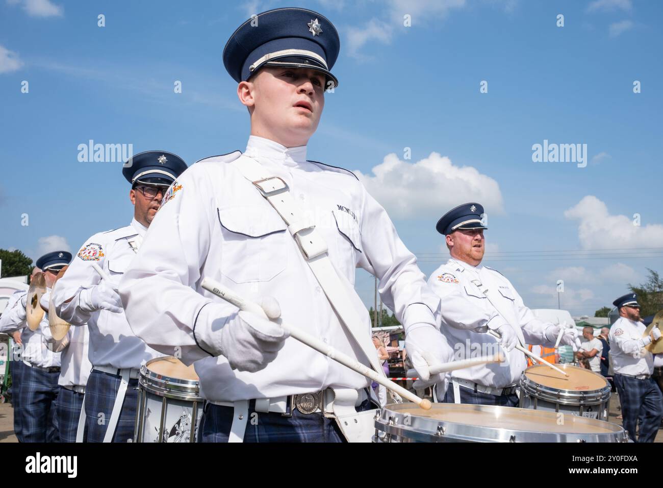 Side drummer close up, parading with Lambeg Orange and Blue Flute Band ...