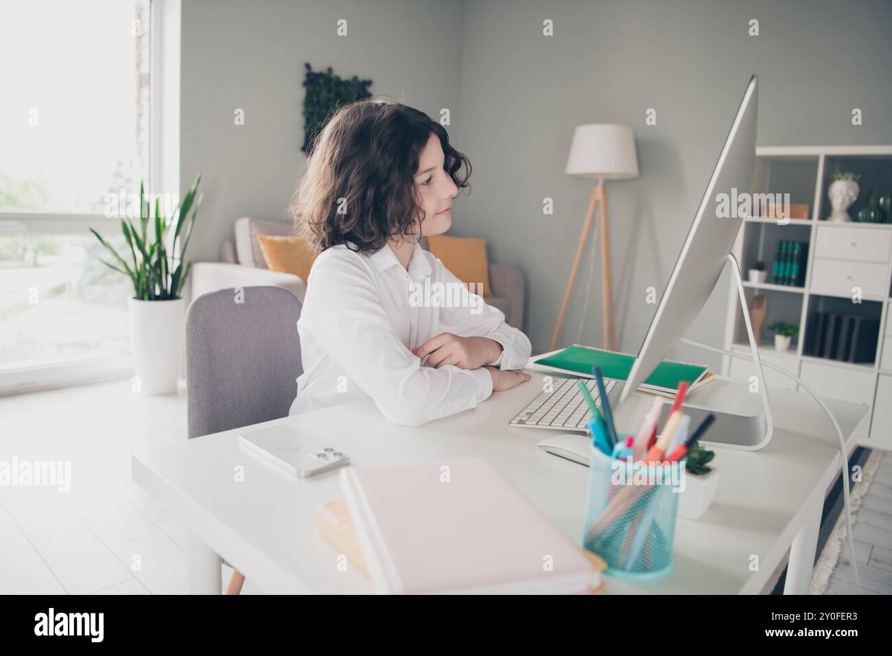Photo of charming cute adorable little boy pupil wearing white shirt ...