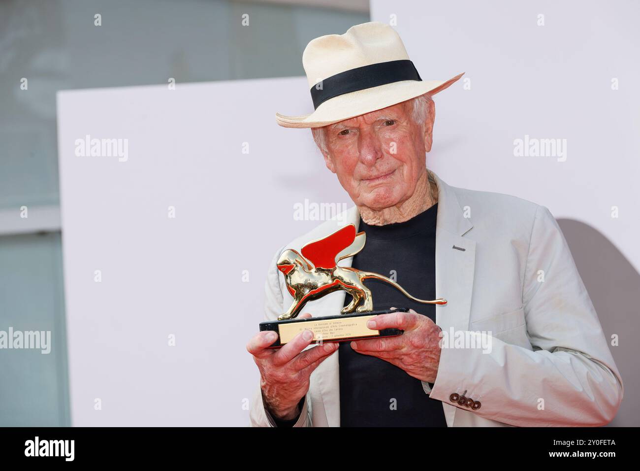 Peter Weir poses with the Golden Lion Lifetime Achievement award during ...