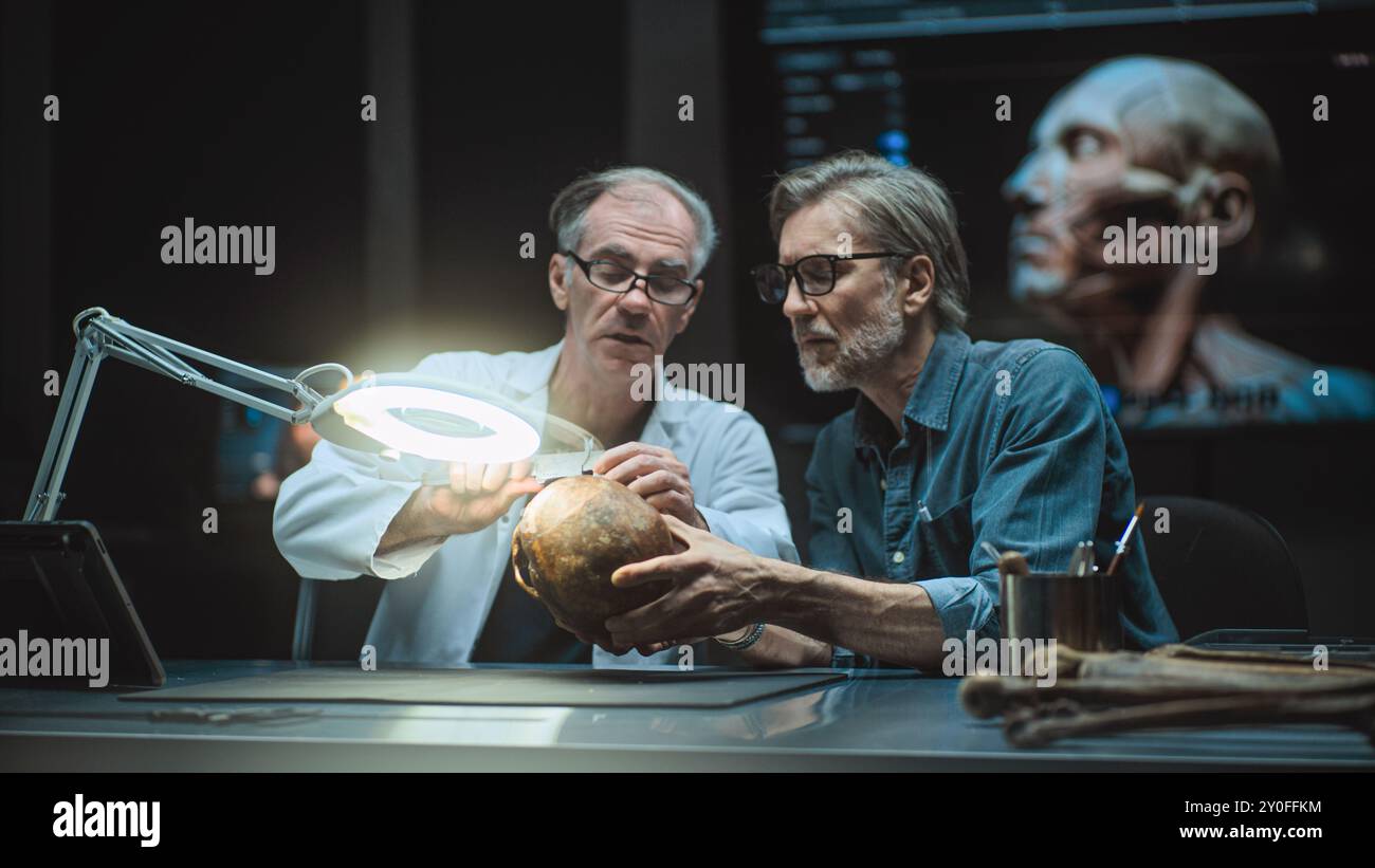 Two archaeologists take measurements of ancient human skull, study ...