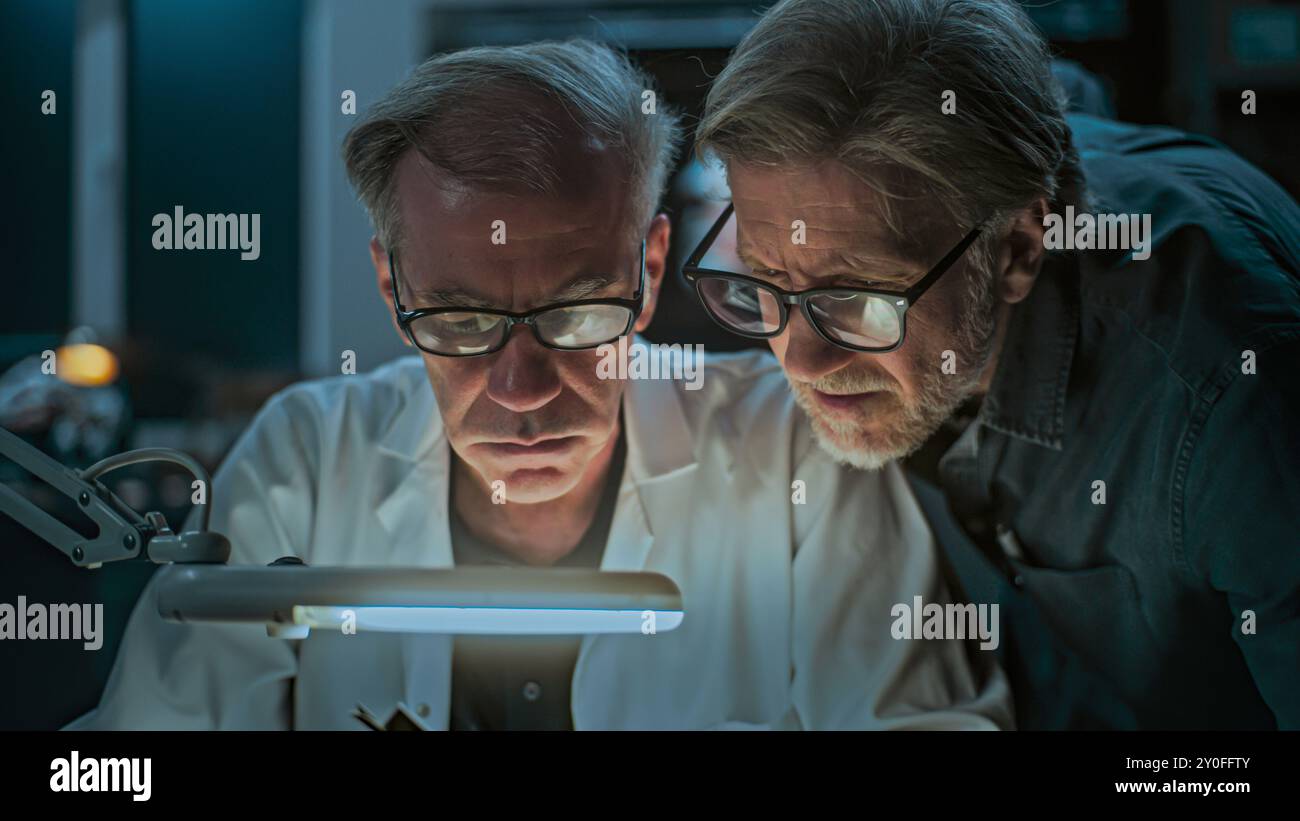 Senior archaeologist takes measurements of fossil bone using measuring ...