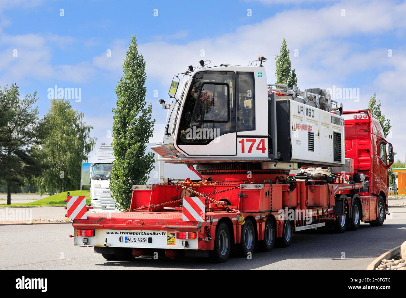 Volvo FH 540 truck transporting Liebherr LR 1160 Crawler crane on ...