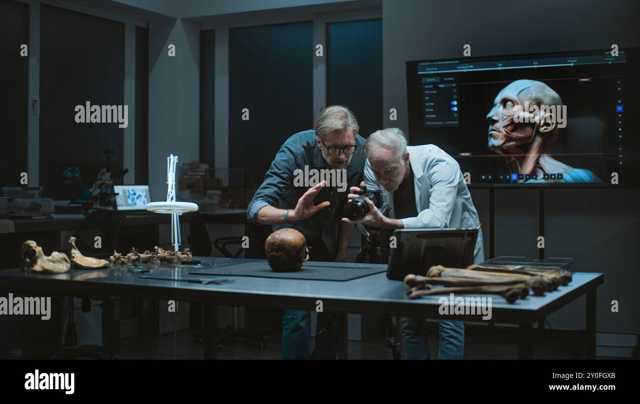 Modern archaeological lab: Two archaeologists or scientists photograph ...