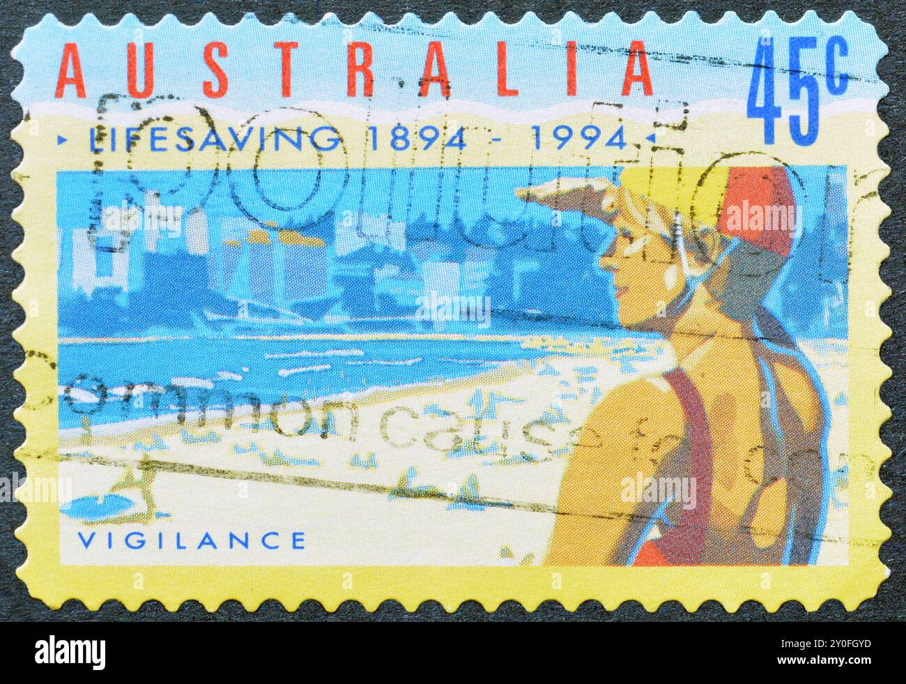 Cancelled postage stamp printed by Australia, that shows Lifeguard on ...