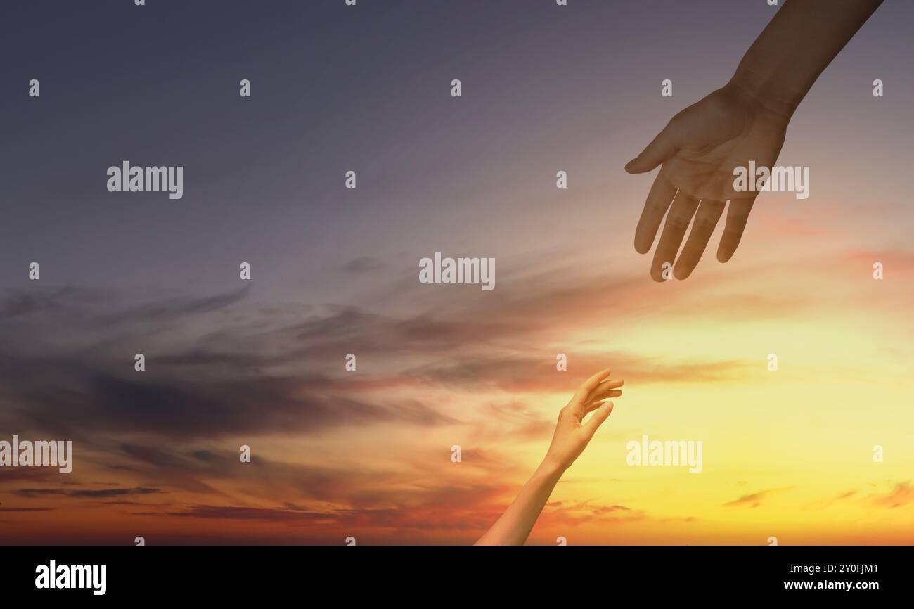 God's help and support. Human reaching for hand from heaven Stock Photo ...
