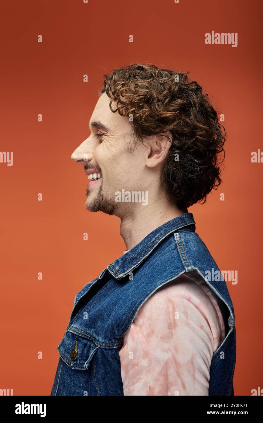 A charming man displays heartfelt emotions in a colorful setting Stock ...