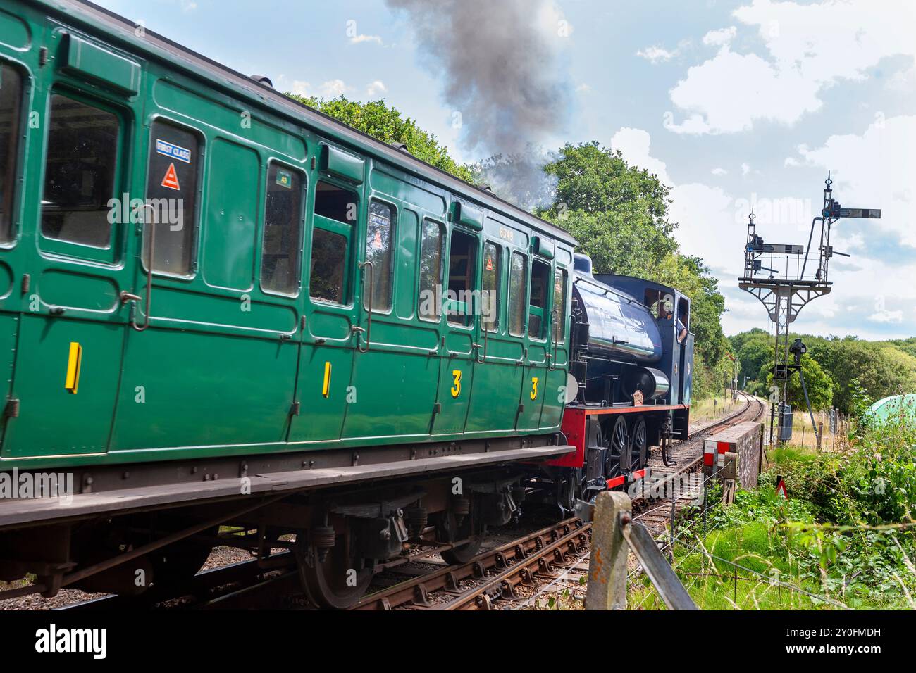 Hunslet ‘Austerity’ WD192 ‘Waggoner’ steam locomotive hauls a train out ...