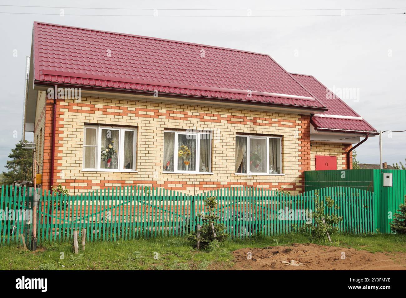 Brick house in the Russian village Stock Photo - Alamy