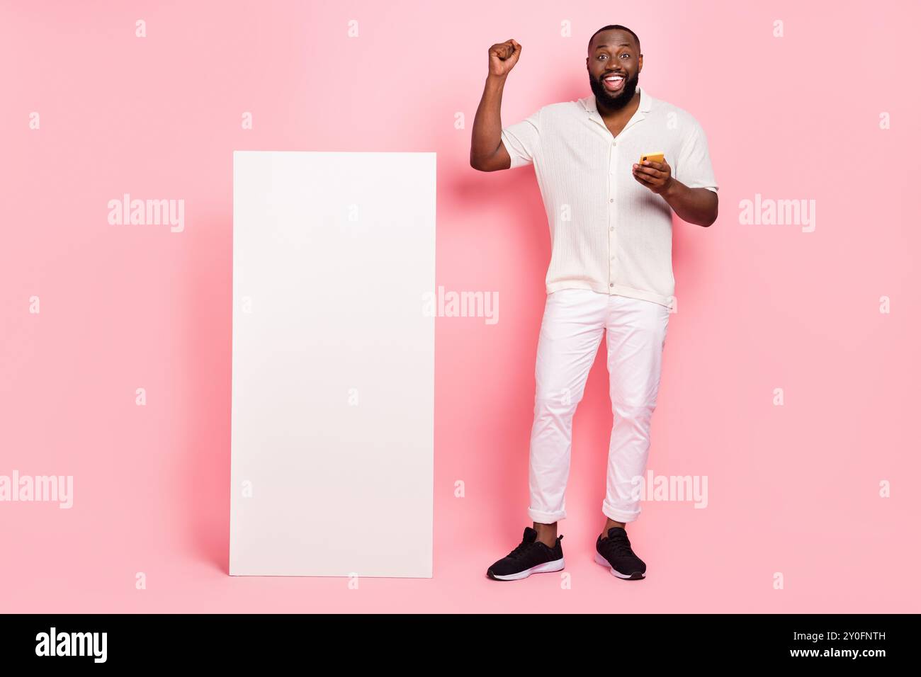 Full length portrait of overjoyed person raise fist celebrate stand ...