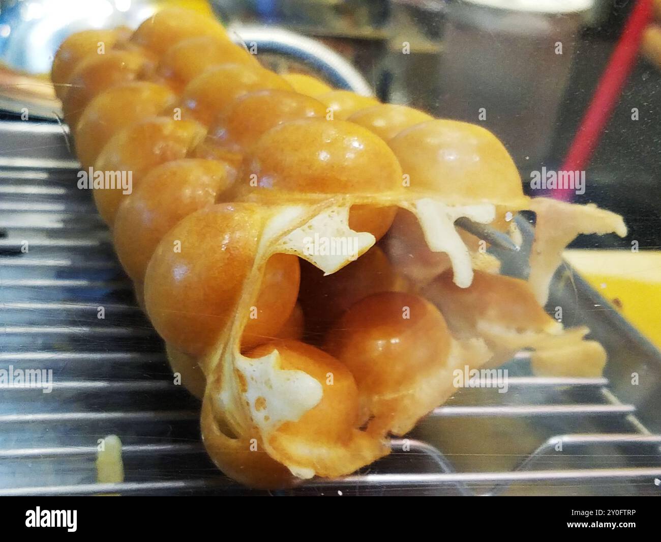 Chinese specialty food egg waffle Stock Photo - Alamy