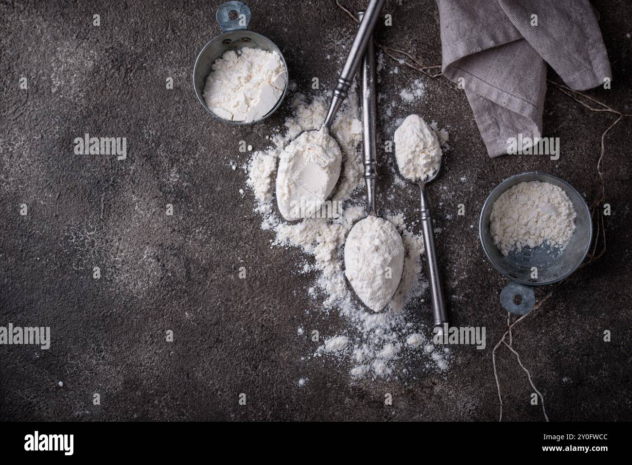 Wheat flour on dark. Baking background Stock Photo - Alamy