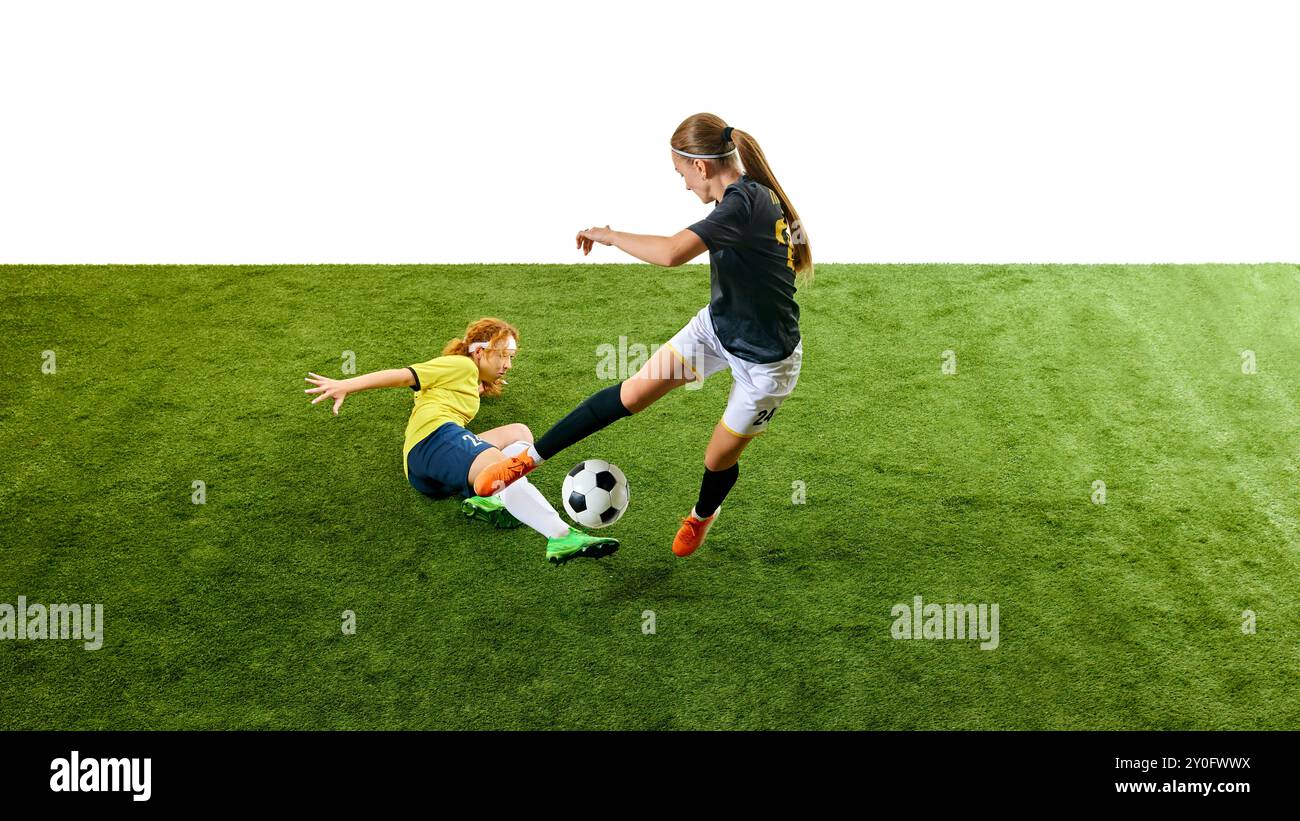 Young women, soccer players, captured mid-stride on green field, each ...