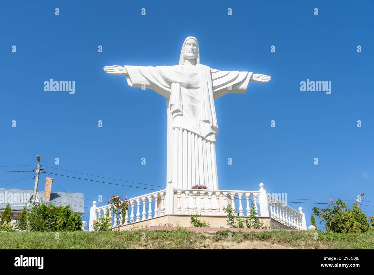 Statue of Jesus Christ against the blue sky. Landmark. Ukraine ...