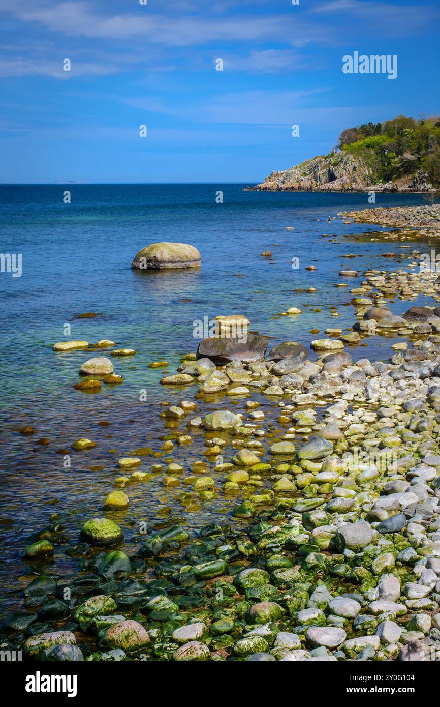 Coastal landscape with blue-green Baltic Sea waters near town of ...