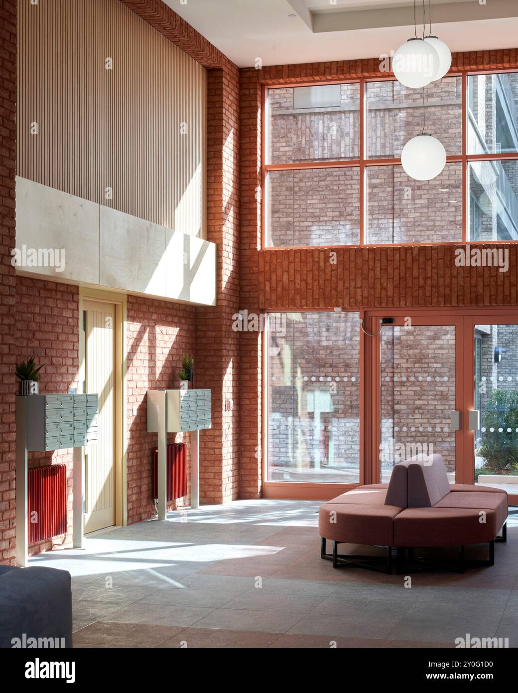 Entrance lounge and foyer. Osier Way, London, United Kingdom. Architect ...