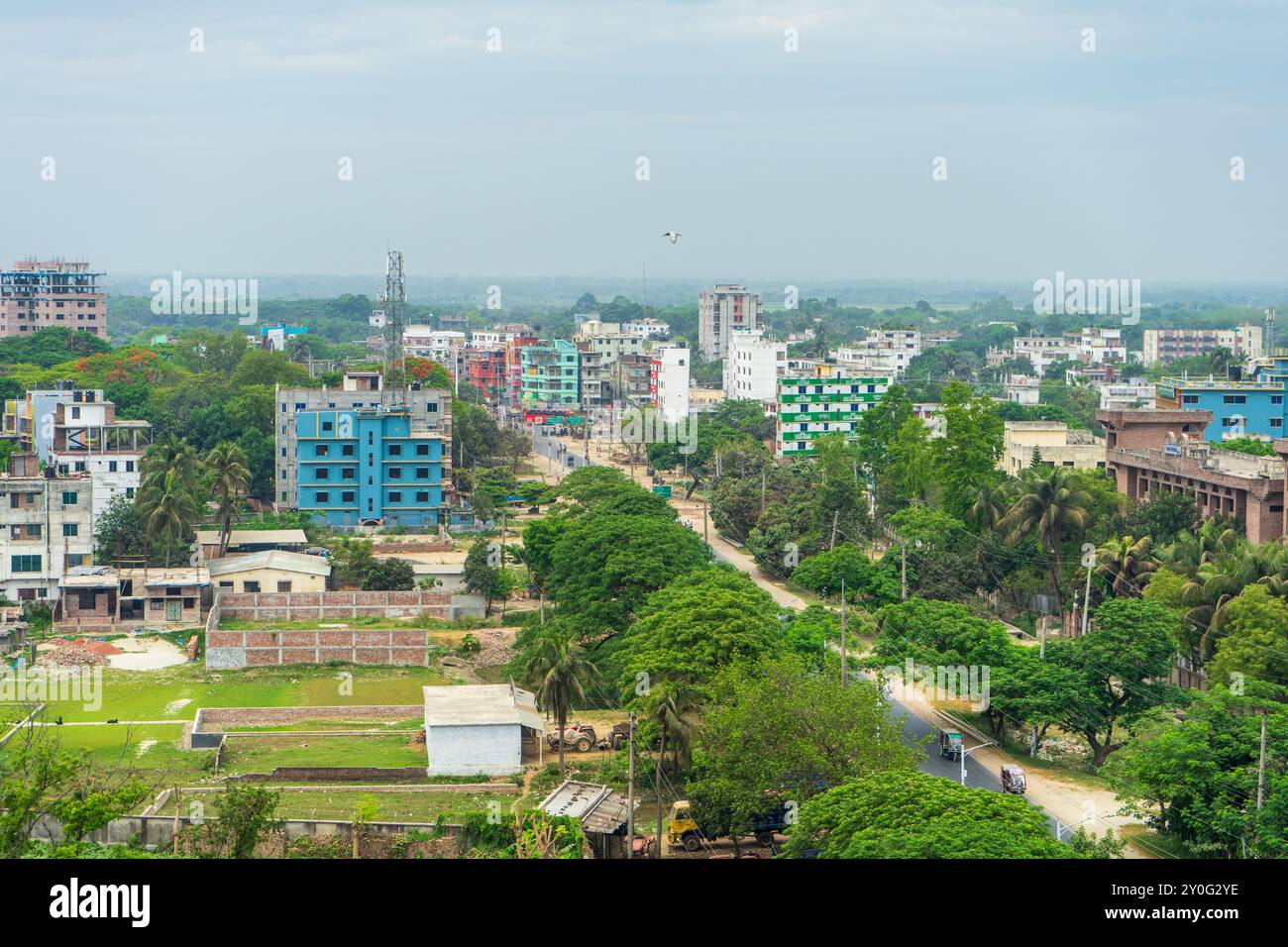 An aerial view of densely built-up area with various buildings of ...