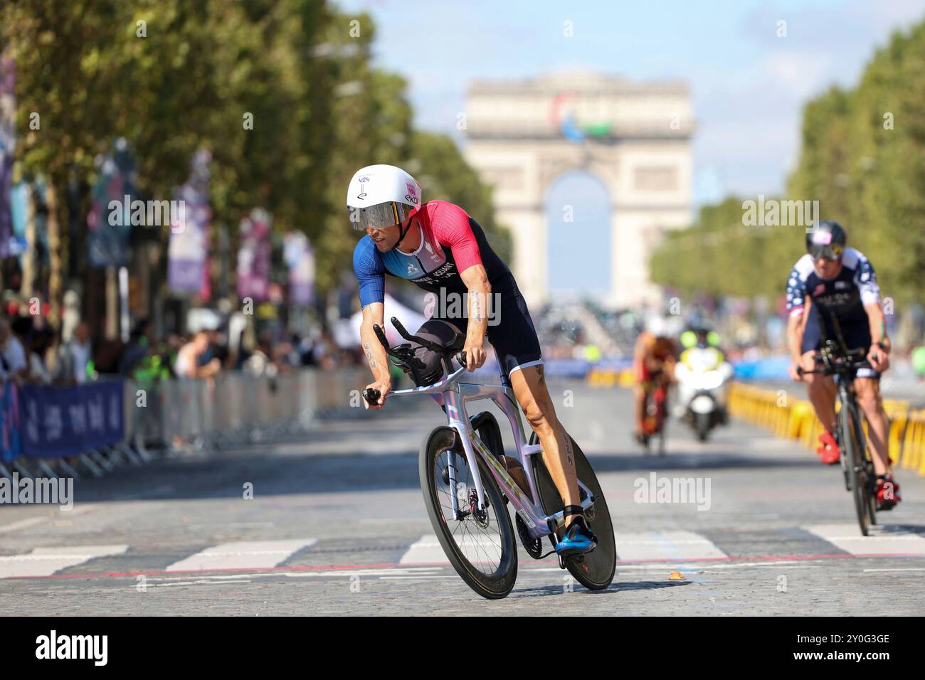 France's Alexis Hanquinquant, left, rides down the Avenue des Champs ...