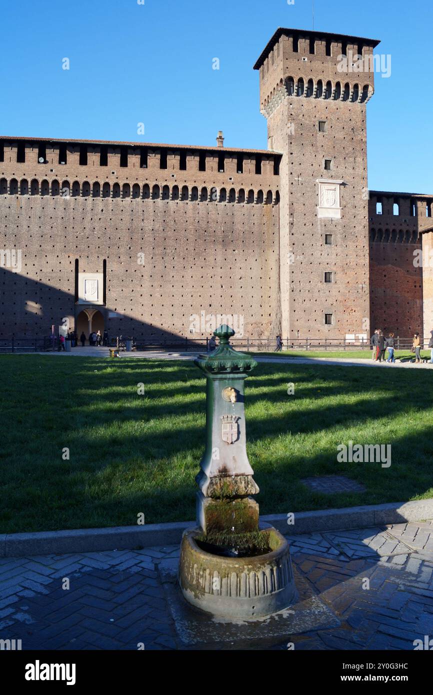 Old drinking water fountain in Sforza Castle, Milan, Italy Stock Photo ...