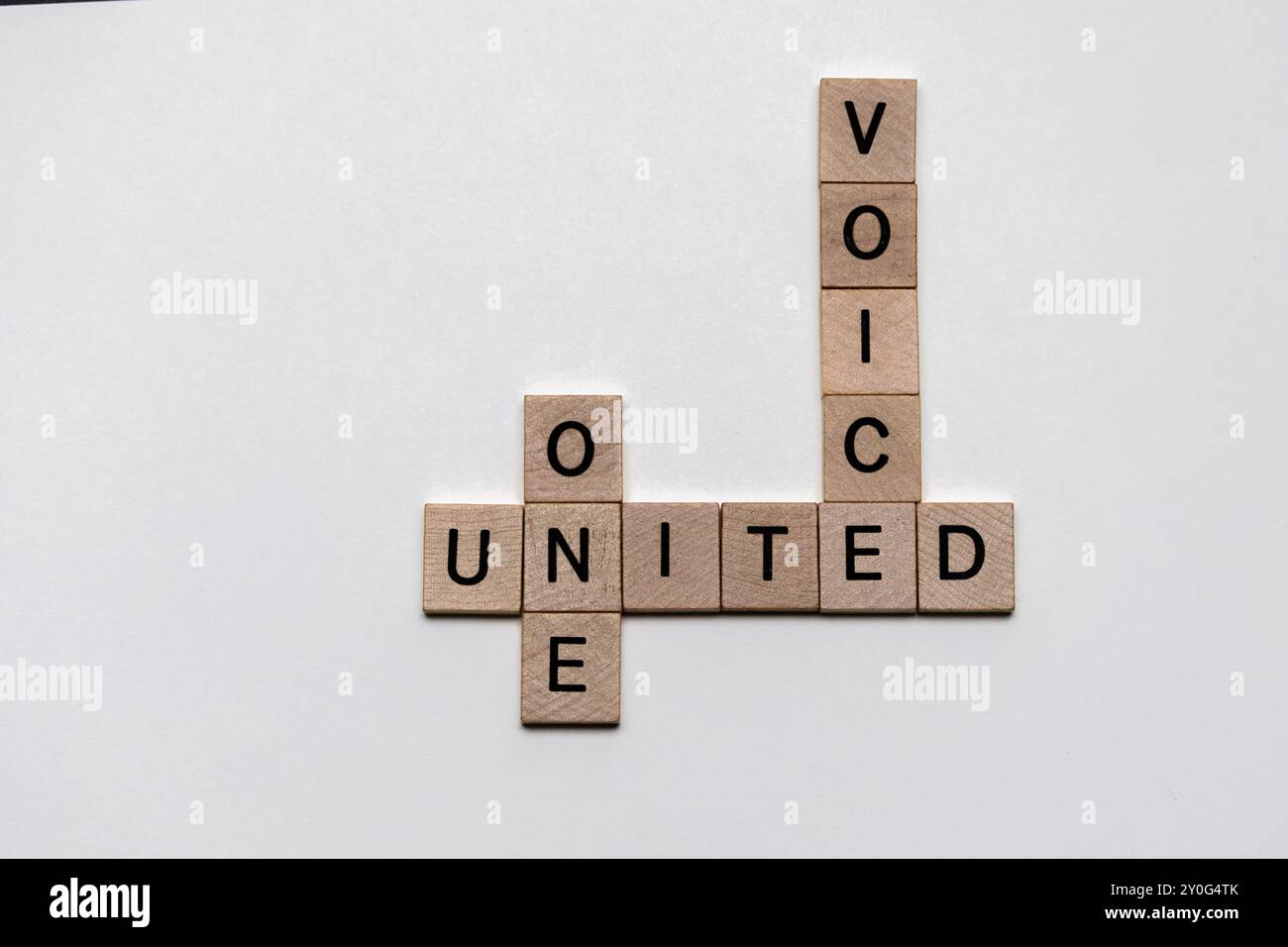 Close-Up of Wooden Tiles Forming Crossword Puzzle with Words "One ...