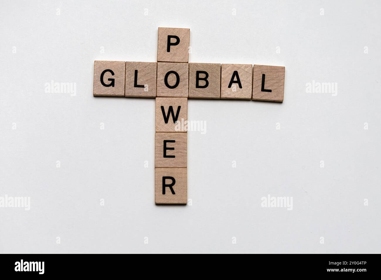 Close-Up of Wooden Tiles Forming Crossword Puzzle with Words "Global ...