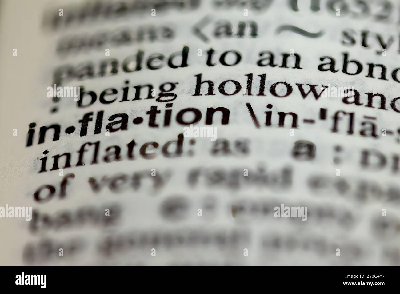 Close-Up of Dictionary Page with the Word "Inflation" – Understanding ...