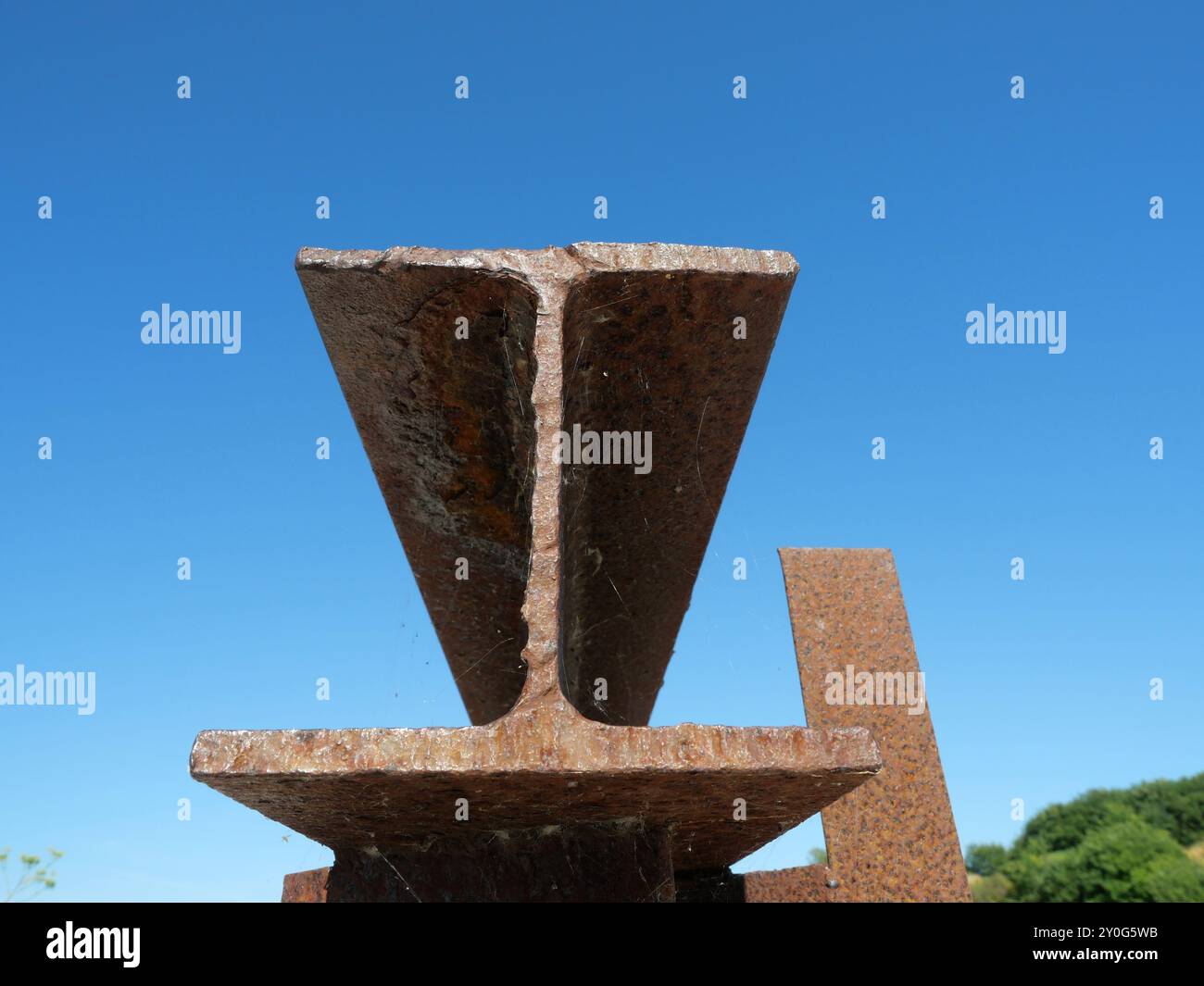 Rusty steel beam with a double-T profile, remnant of an old pier ...