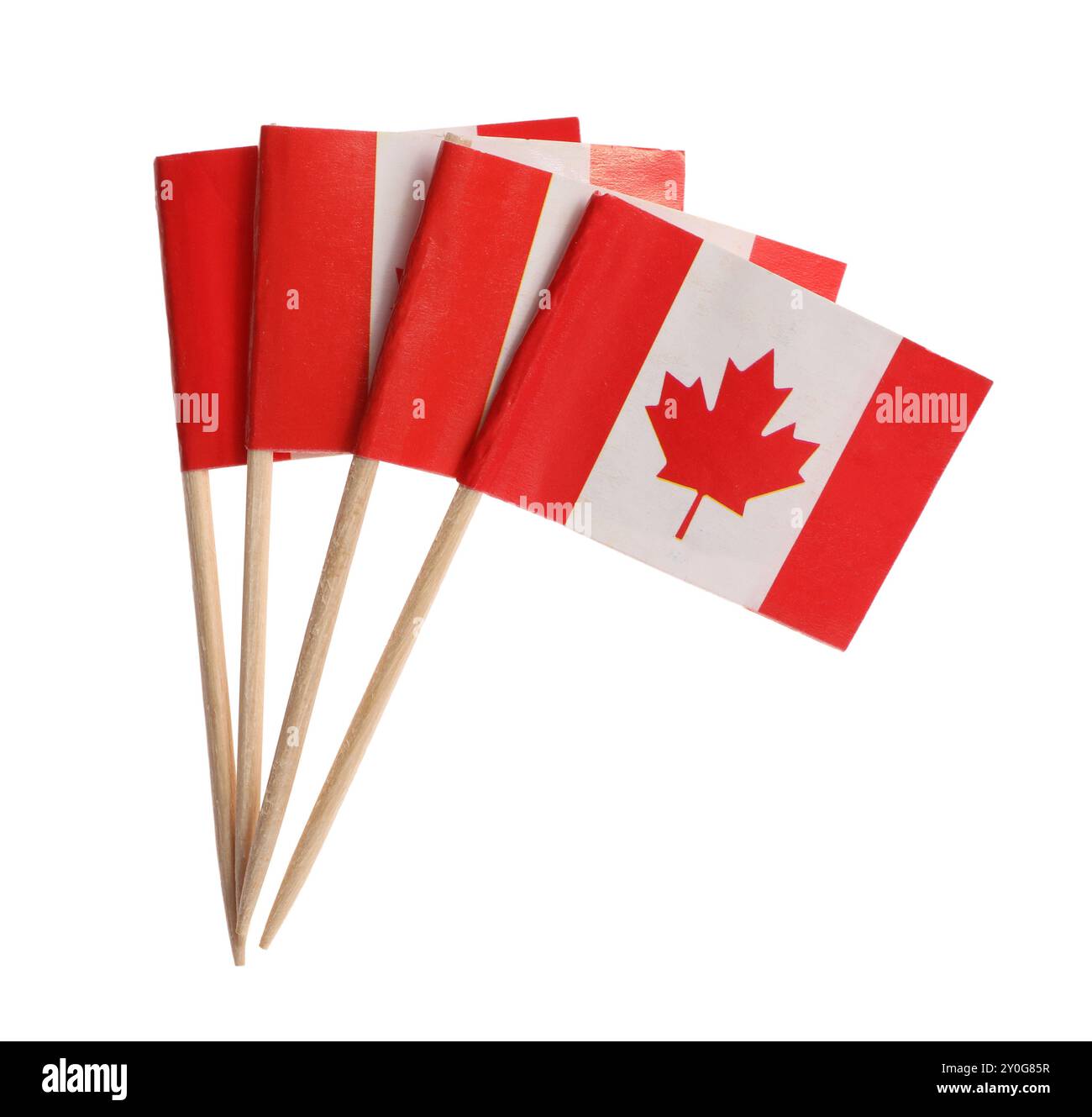 Small paper flags of Canada isolated on white Stock Photo - Alamy