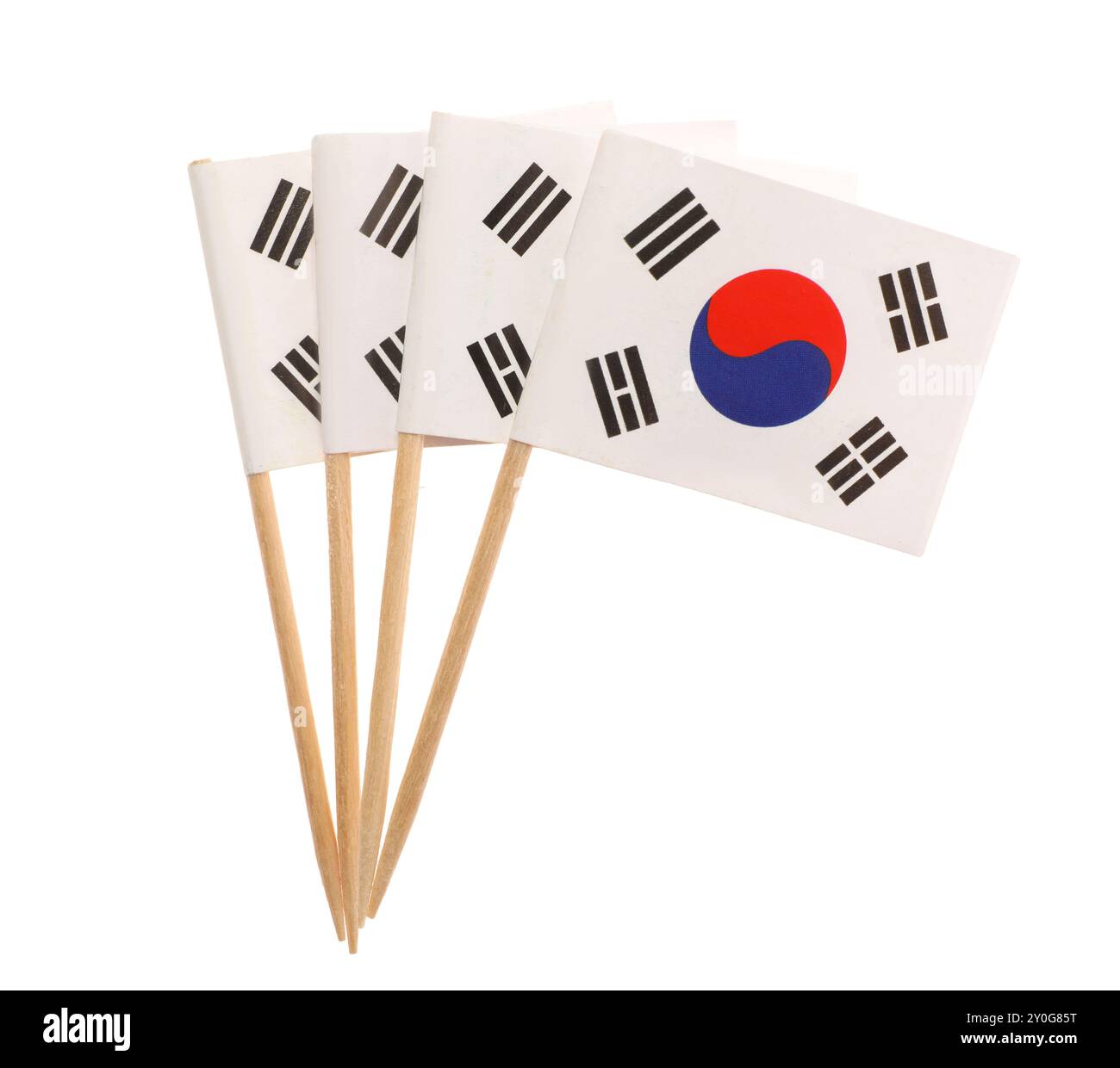 Small paper flags of South Korea isolated on white Stock Photo - Alamy