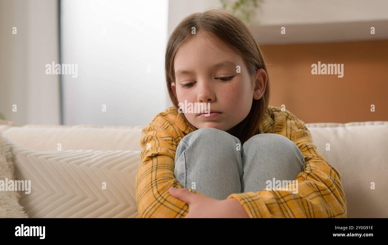 Stressed unhappy sad pensive Caucasian kid little girl feeling ...