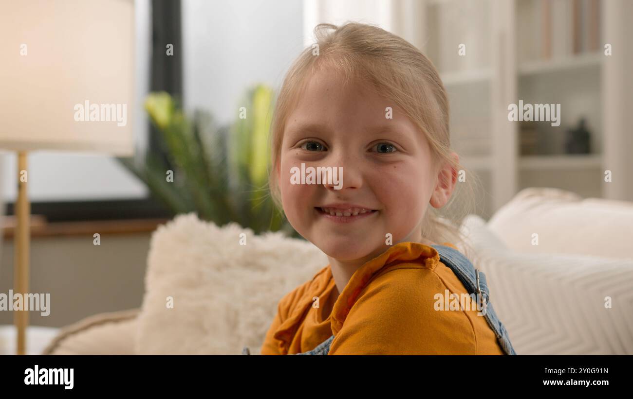 Positive happy Caucasian kid schoolchild gen z child pose looking at ...