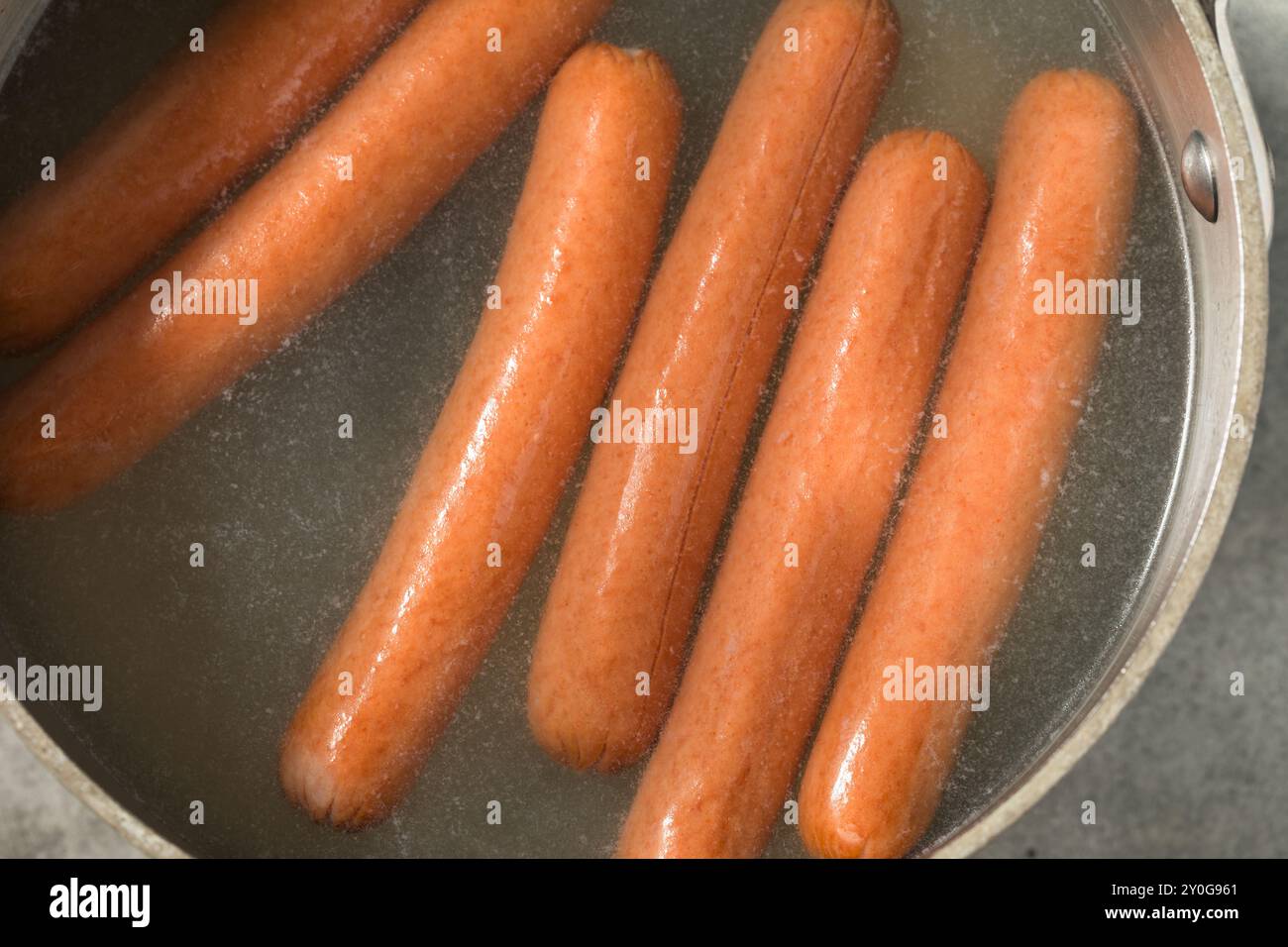 Homemade American Boiled Hot Dogs in Water Stock Photo - Alamy
